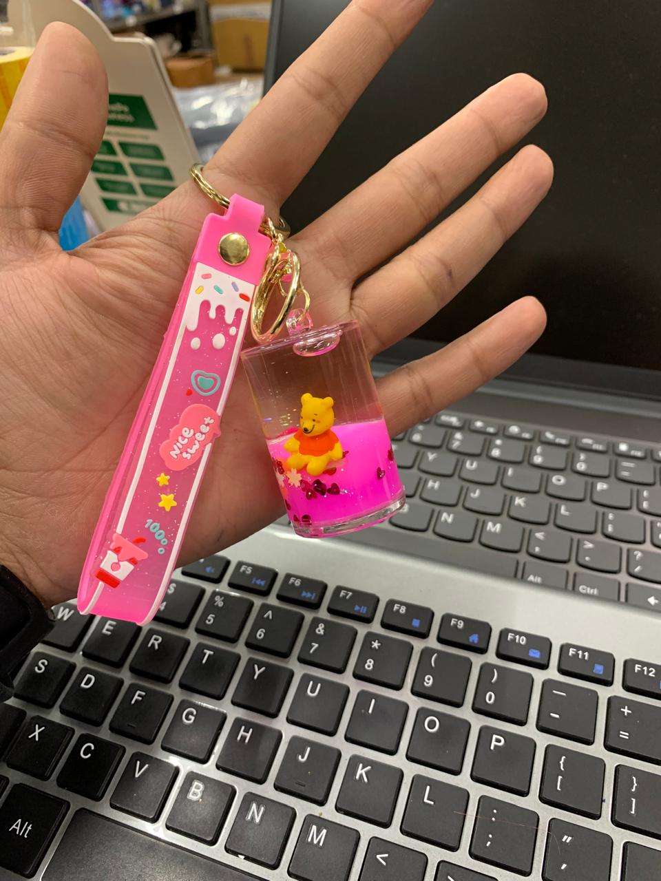 Wini poo in cylinder Shape water keychain ( pack of 3 ) – Big Daddy Store